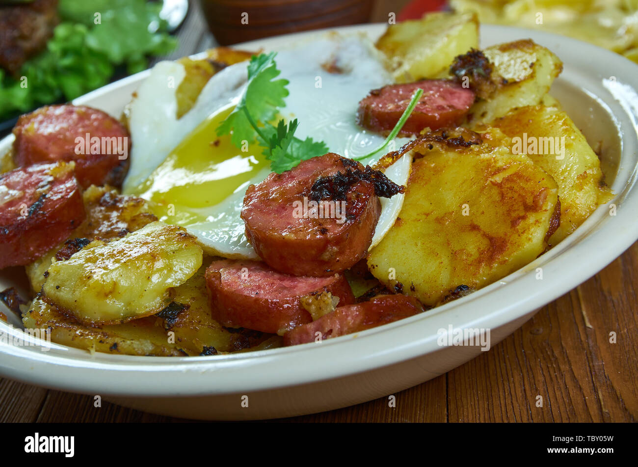 Tiroler Grostl, fried potatoes , bacon and onion. Austrian national ...