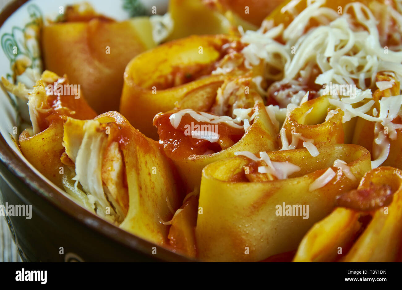 paccheri pasta bake with meat sauce - Paccheri al forno Stock Photo - Alamy