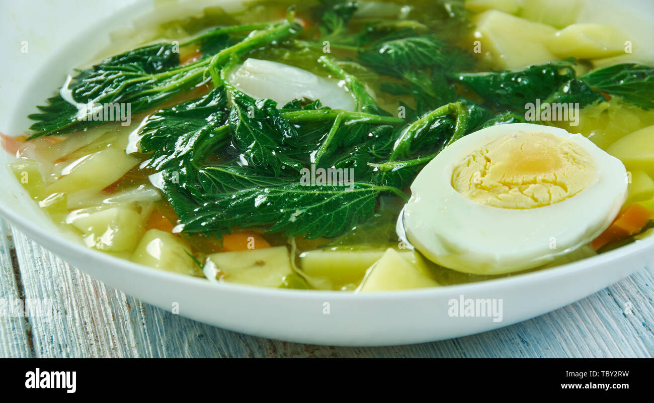 Spring vegetable soup nettle with egg, close up Stock Photo - Alamy