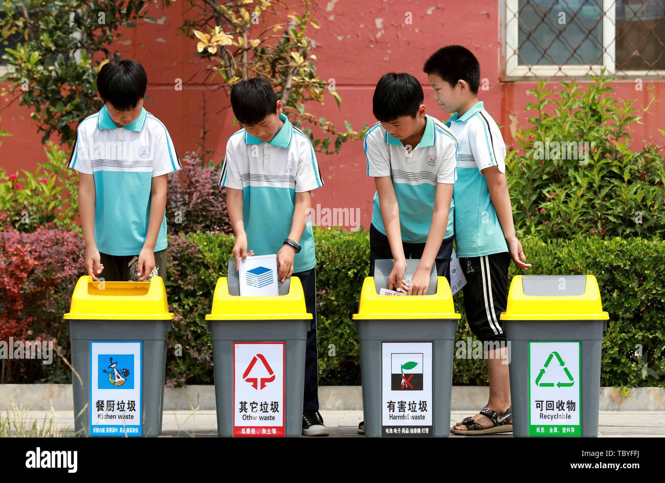 Xingtai, China's Hebei Province. 4th June, 2019. Students throw wastes ...
