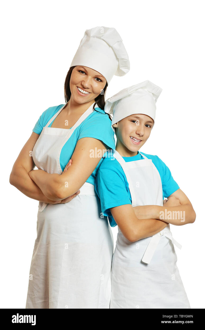 Smiling female chef with assistant on white background Stock Photo - Alamy