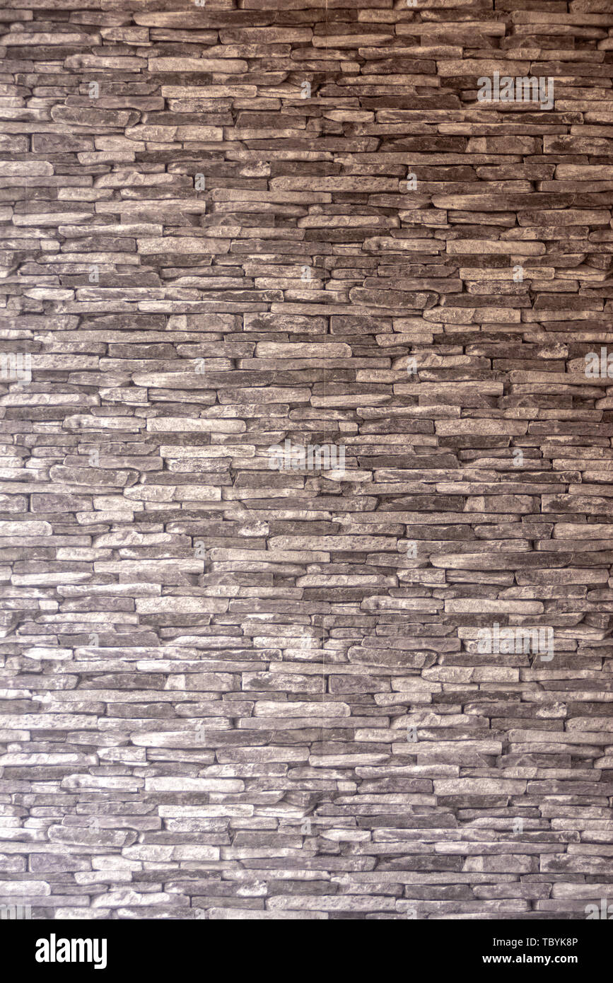 realistic stone wall wallpaper Stock Photo - Alamy