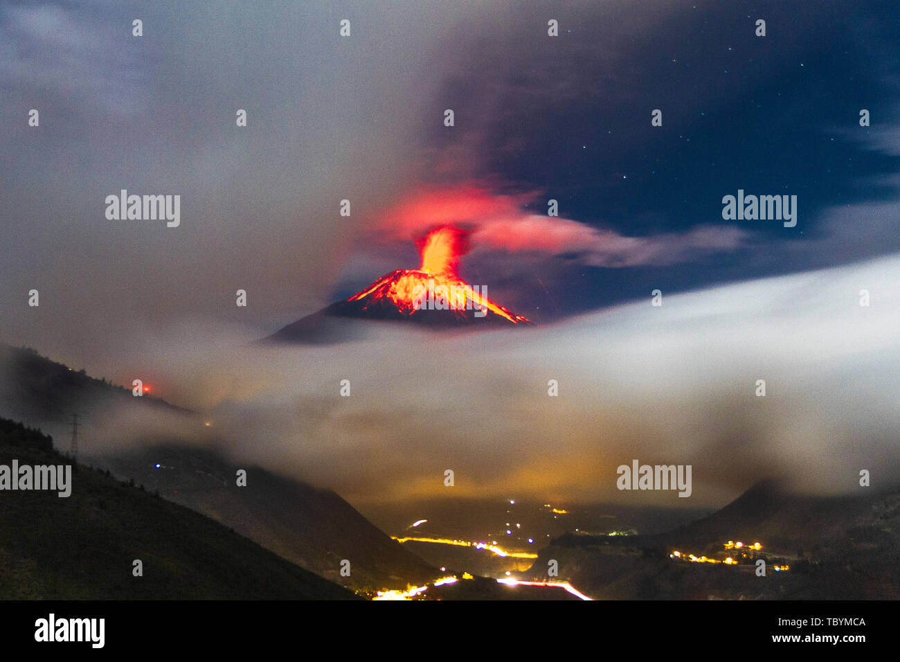 Volcanic eruption shown in Tungurahua volcano with Banos city Stock ...
