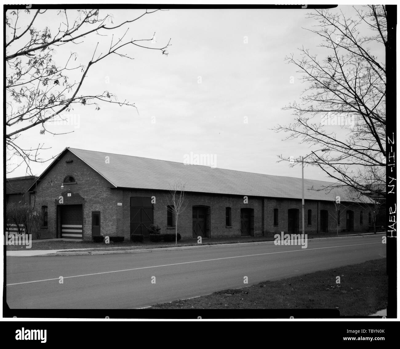 N and W ELEVATIONS, SHOWING AT THE LEFT THE 1942 MOTOR POOL GARAGE ...
