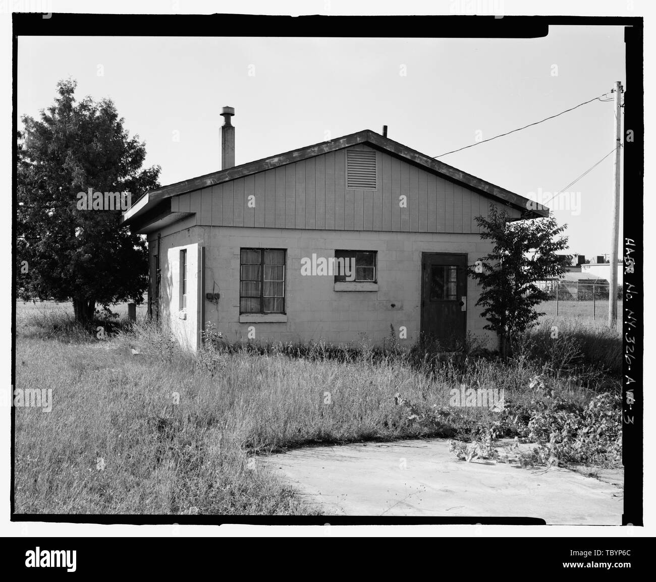NORTH (REAR) AND EAST (SIDE) ELEVATIONS OF BUILDING. VIEW TO SOUTH ...
