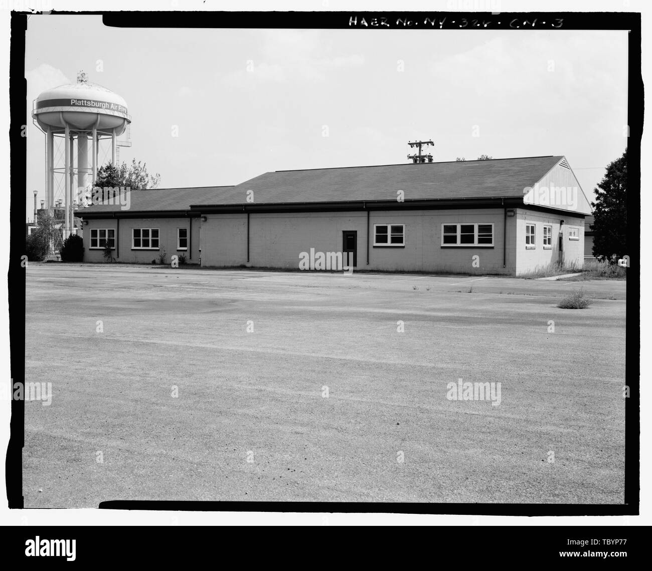 NORTH (REAR) AND WEST (SIDE) ELEVATIONS OF BUILDING. VIEW TO SOUTHEAST ...
