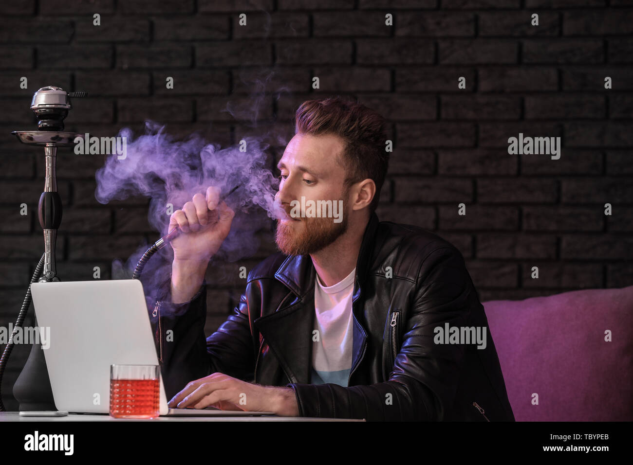 Young turkish man laptop hi-res stock photography and images - Alamy