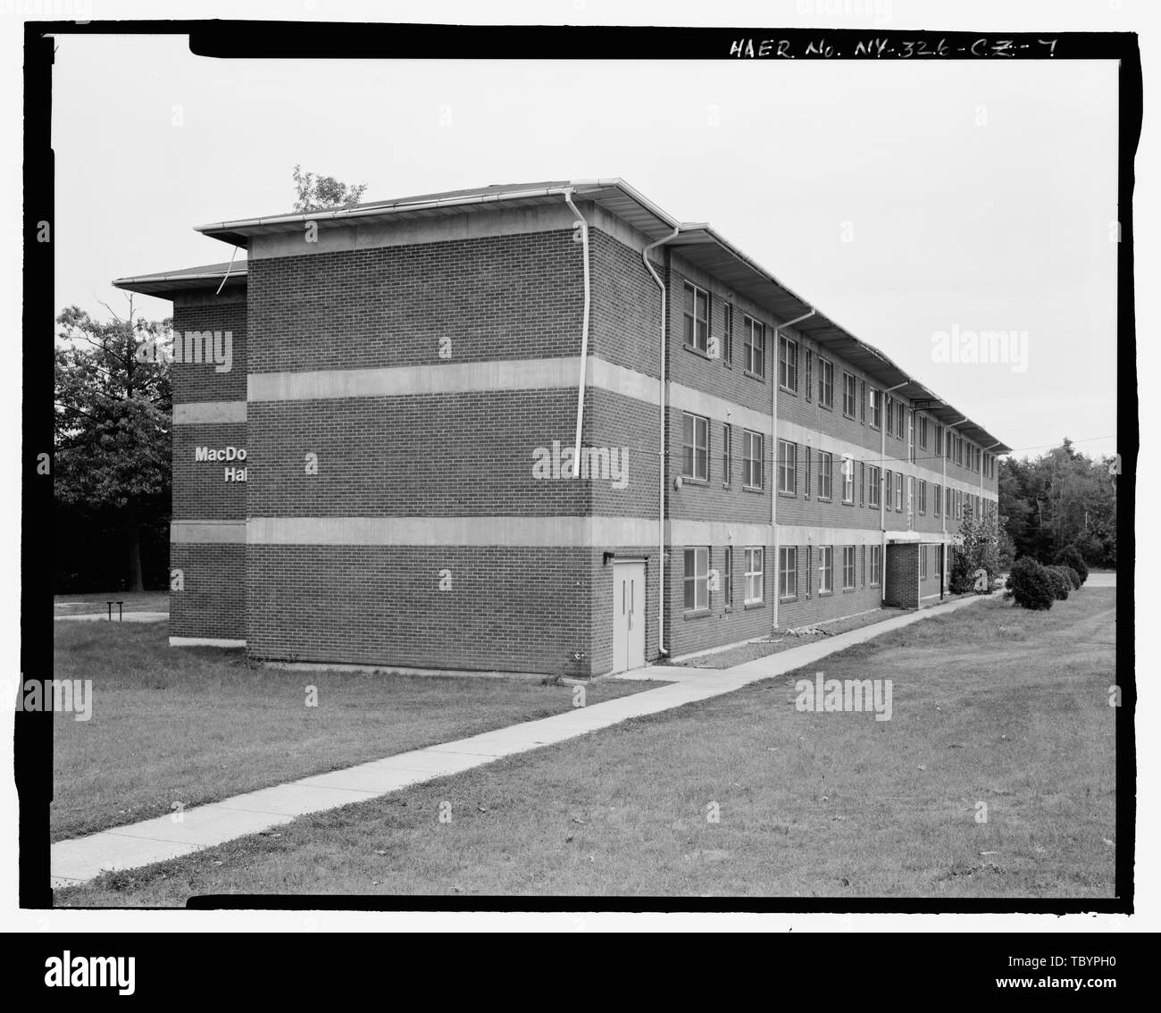 NORTH (SIDE) AND WEST (FRONT) ELEVATIONS OF BUILDING. VIEW TO SOUTHEAST ...