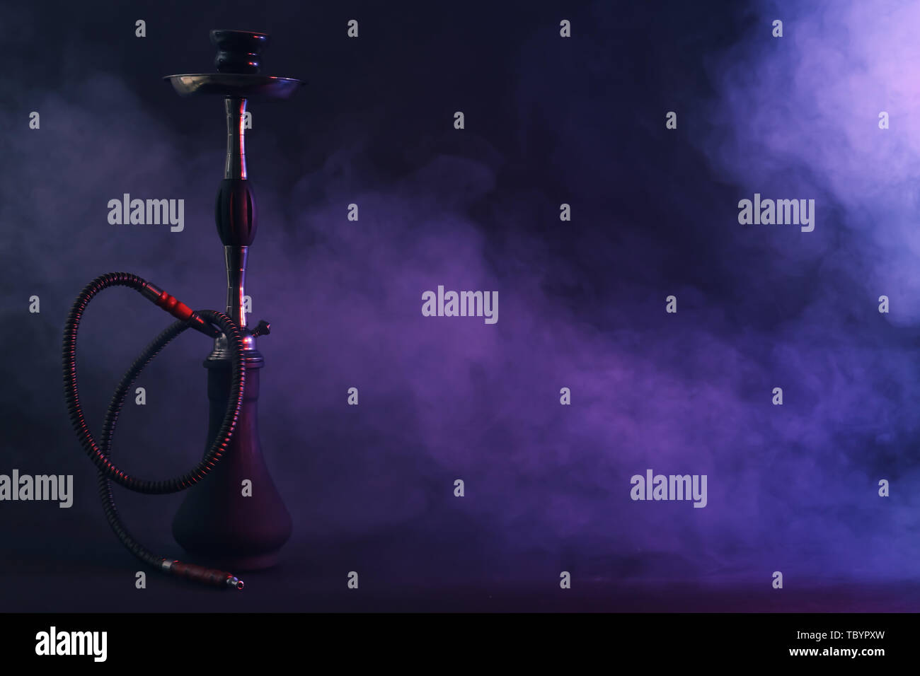 Hookah with fume on dark background Stock Photo - Alamy
