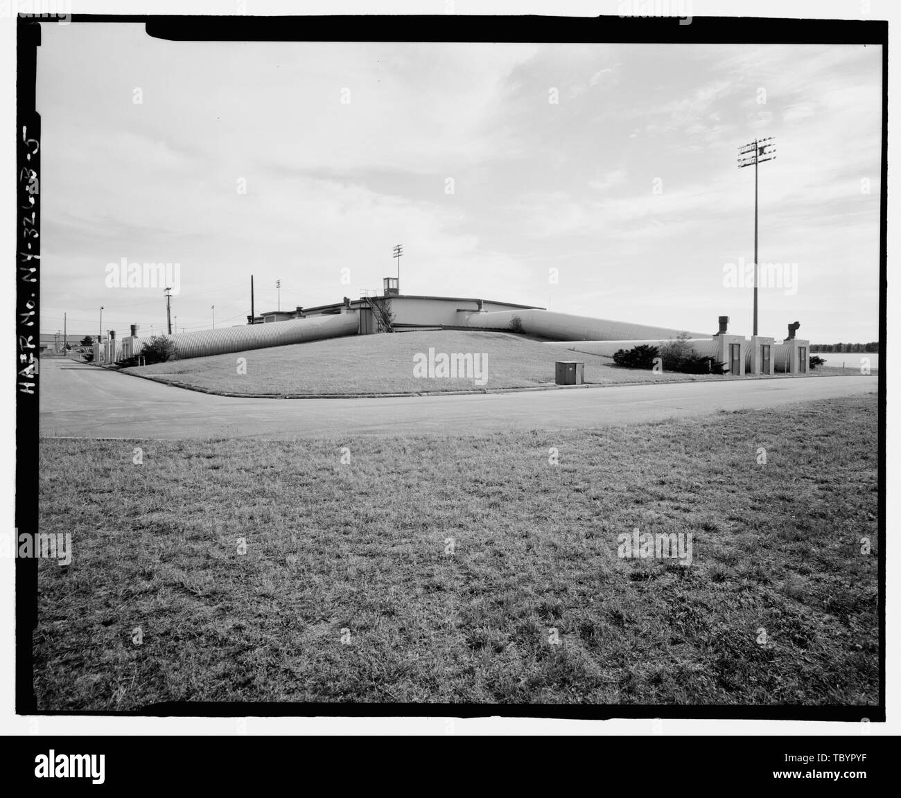 NORTH AND EAST ELEVATIONS OF BUILDING. view TO SOUTH Plattsburgh Air ...
