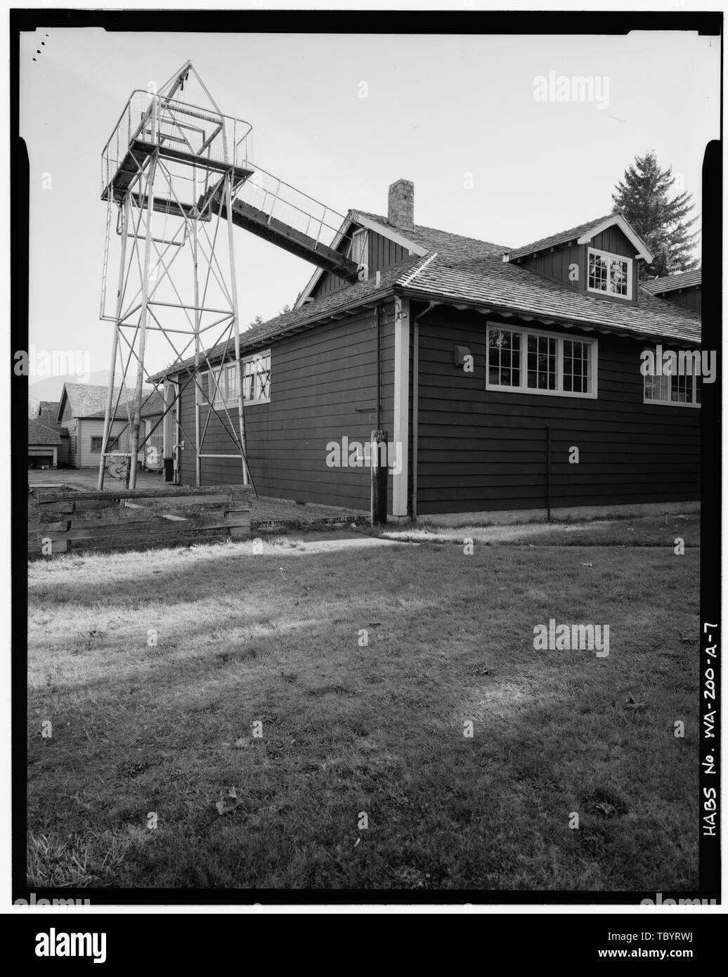 NORTH CORNER. HOSE DRYINGHELITACK SCAFFOLD IN LEFT FOREGROUND. BRICK ...
