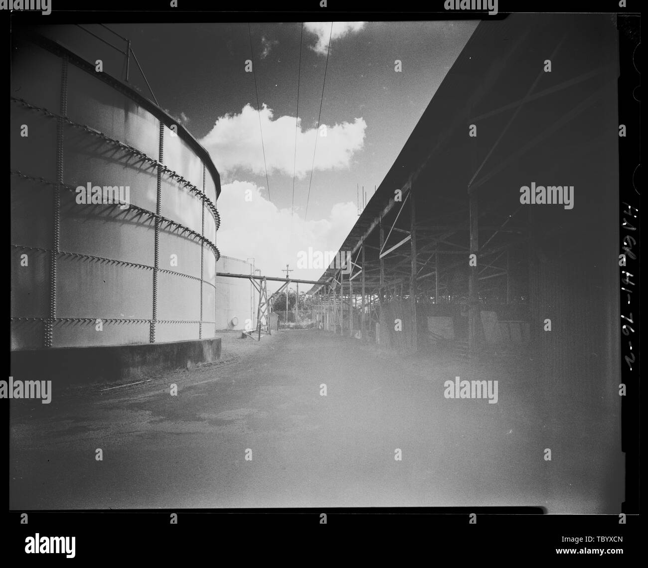 New rain shed (Building No. 241) and steel water tanks with pipeline ...