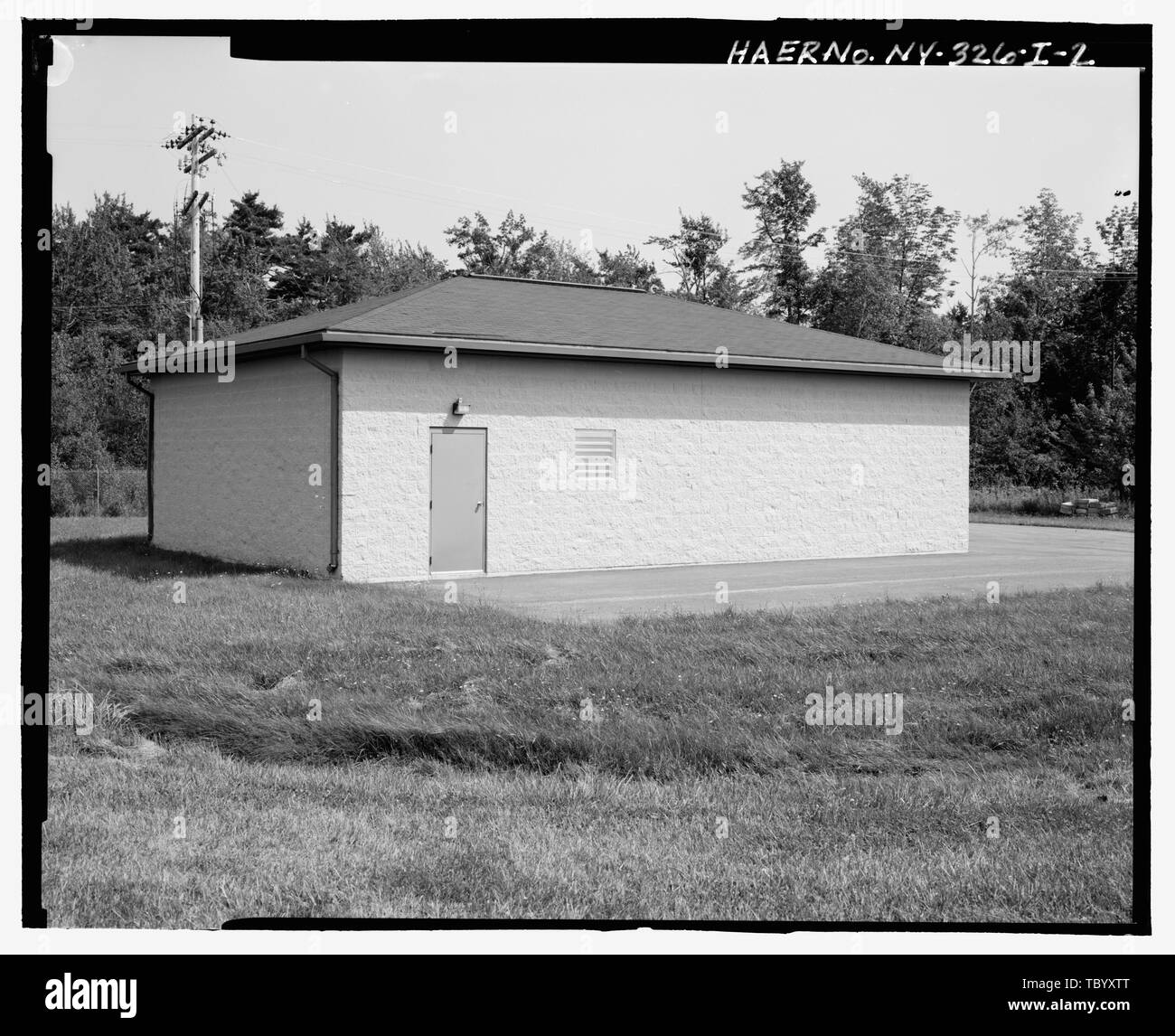 North (rear) and west (side) elevations of building. View to southeast ...