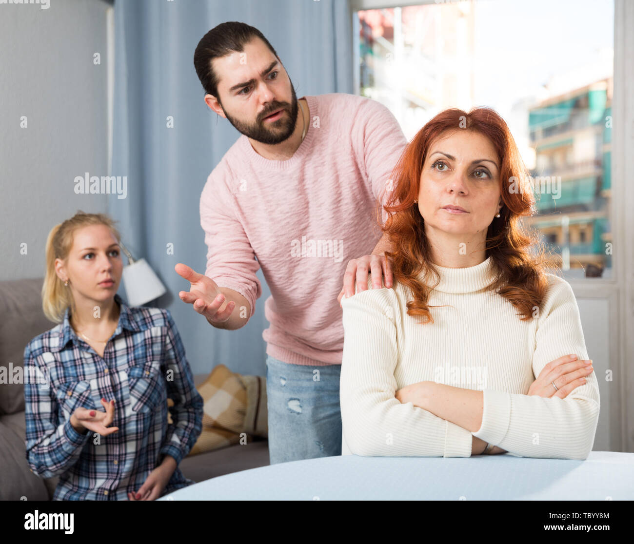 Young serious couple has a family stressful conversation at home Stock Photo - Alamy