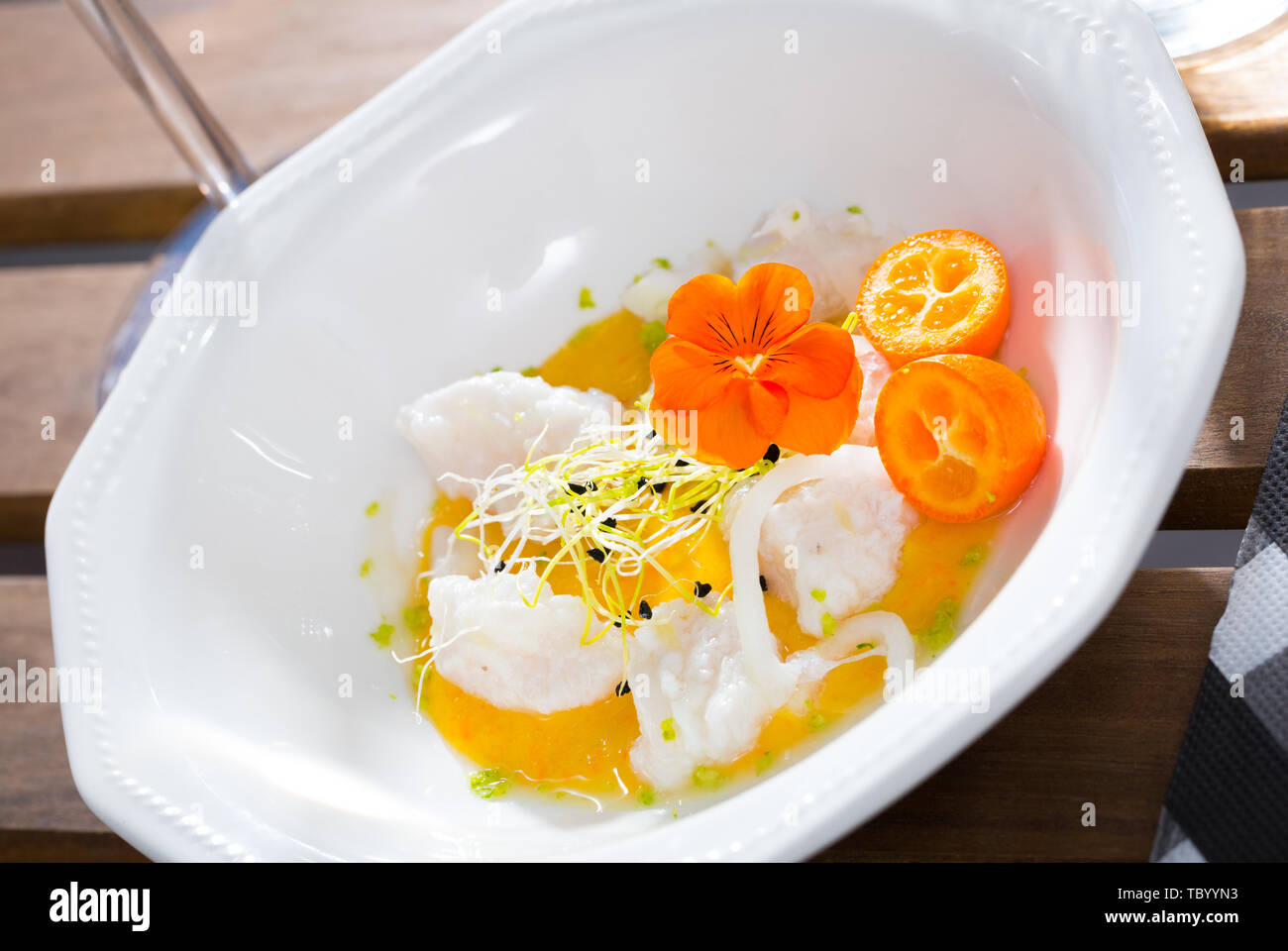 Sea food – cod ceviche with avocado spicy sauce and kumquat Stock Photo ...