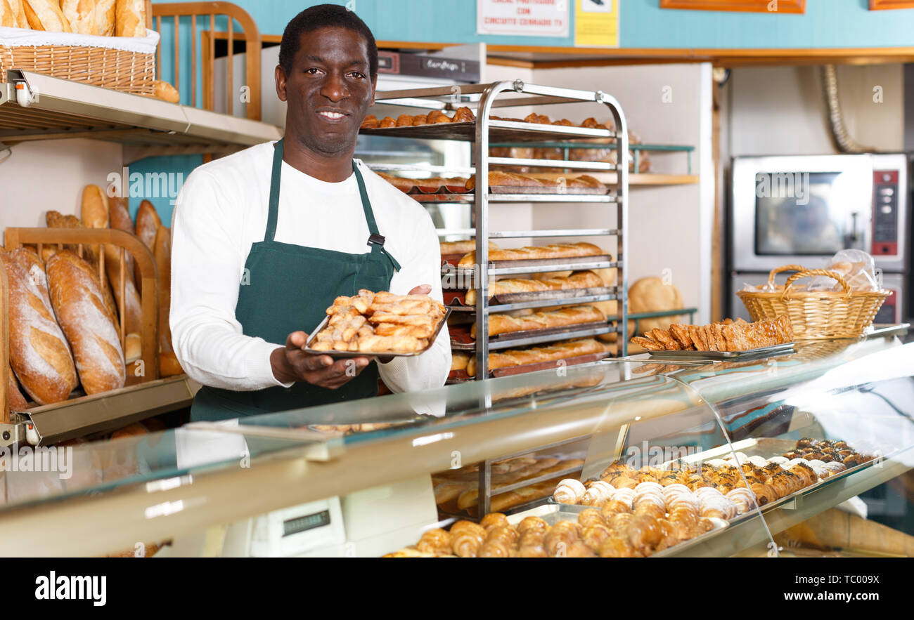 Successful baker working behind hi-res stock photography and images - Alamy