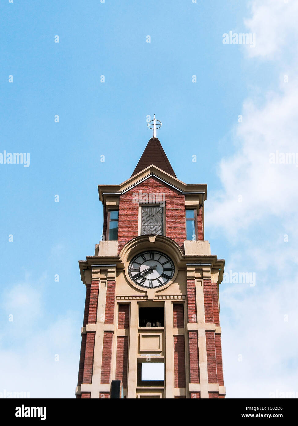 Clock tower in the sun Stock Photo - Alamy
