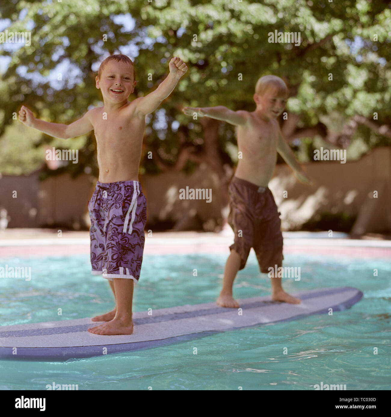 Balancing on a surf board hi-res stock photography and images - Alamy