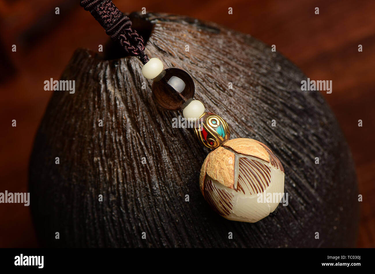 Bodhi pendant, necklace, wool chain Stock Photo - Alamy