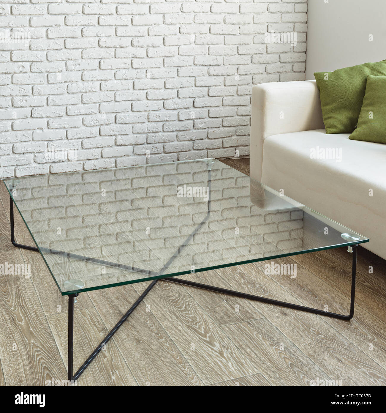 modern glass table in the loft interior Stock Photo - Alamy