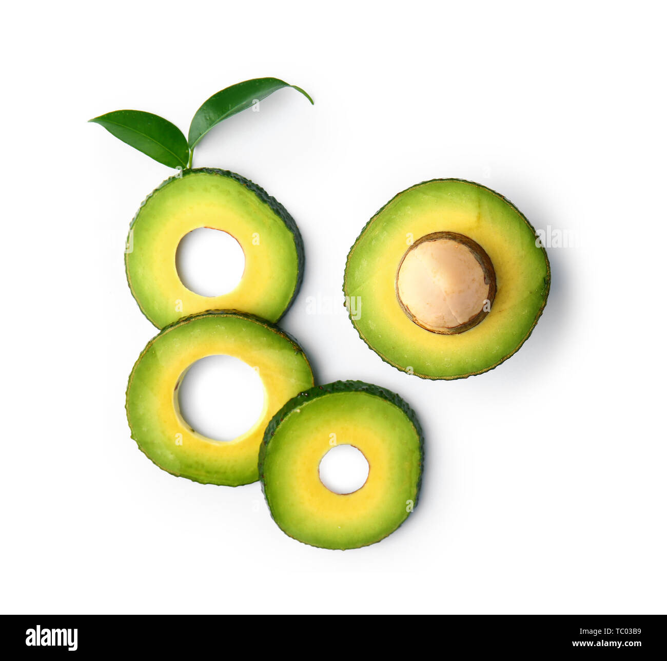 Fresh cut avocado on white background Stock Photo - Alamy