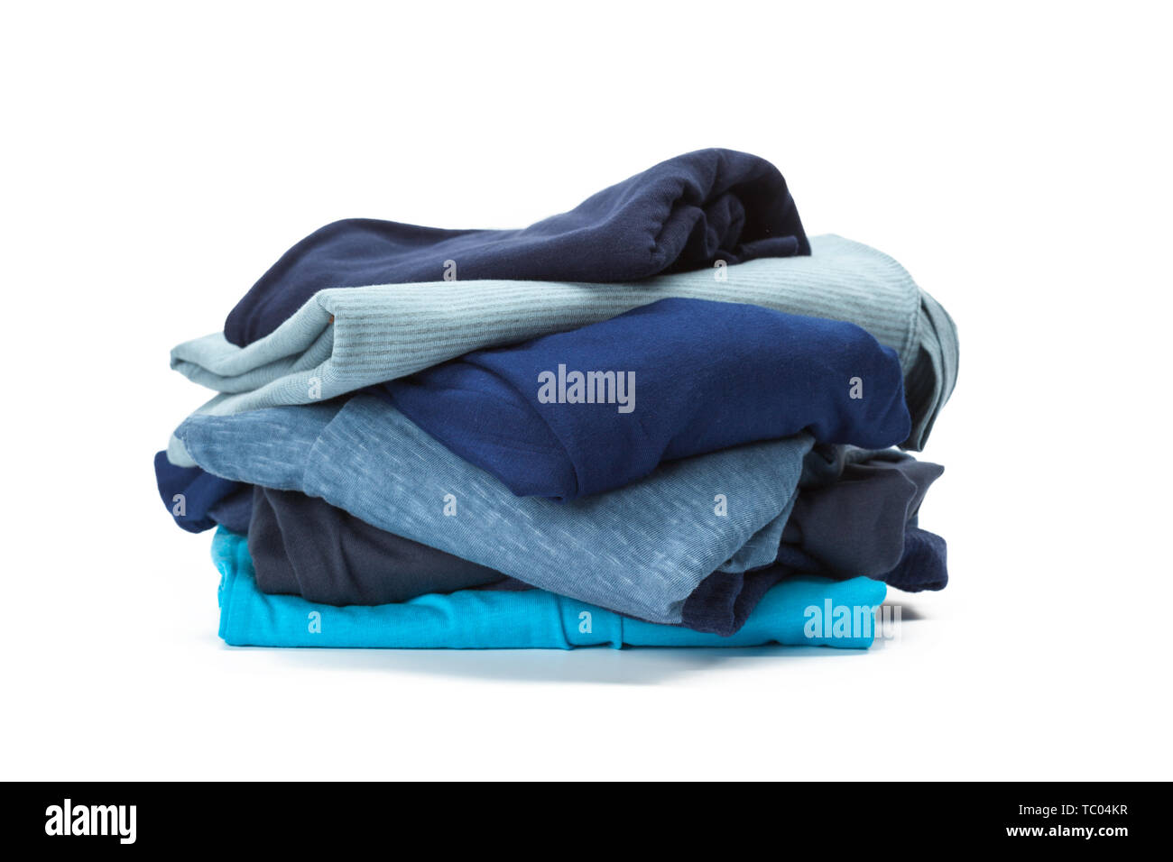 Stack of clothes on white background, closeup Stock Photo - Alamy