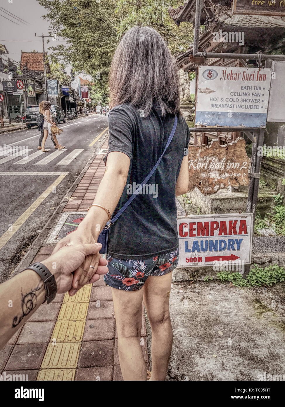 Take your hand around the world Stock Photo - Alamy