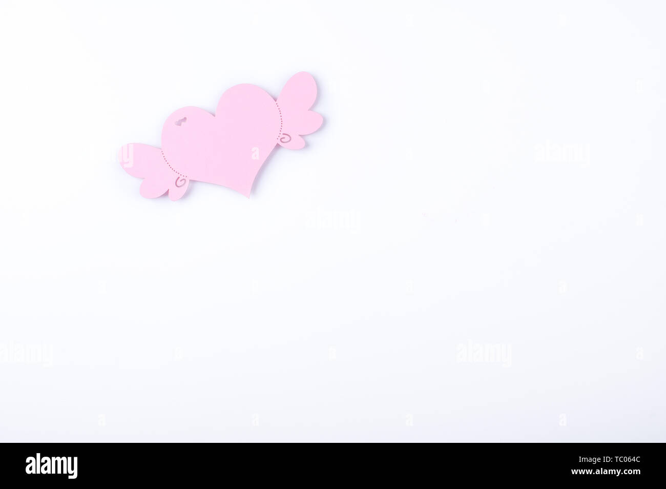 Pink cherubs love heart shape on white background Stock Photo - Alamy