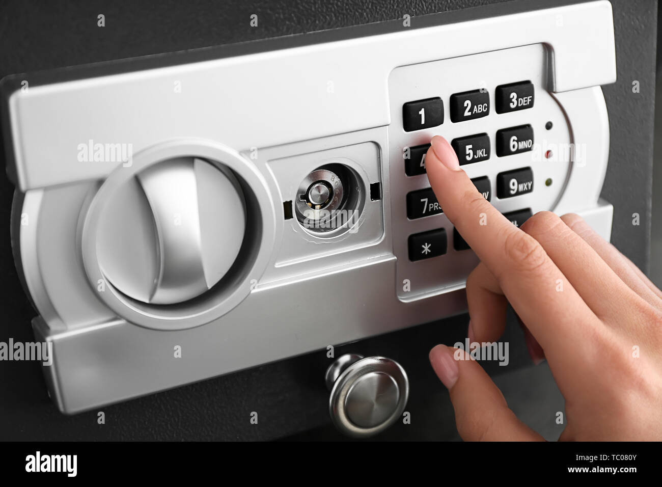 Opening locker hand hi-res stock photography and images - Alamy