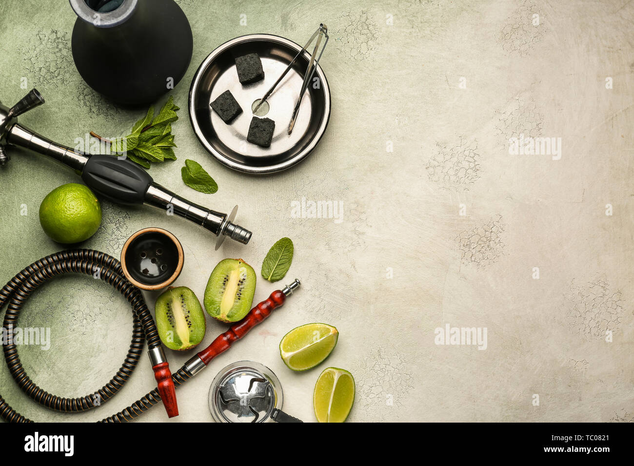 Composition with parts of hookah on light background Stock Photo - Alamy