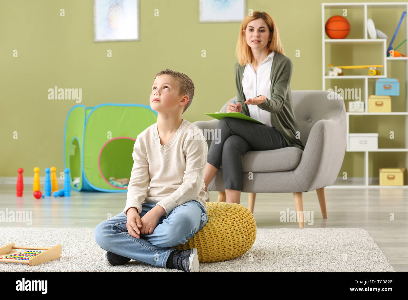 Little boy with autistic disorder at child psychologist's office Stock ...