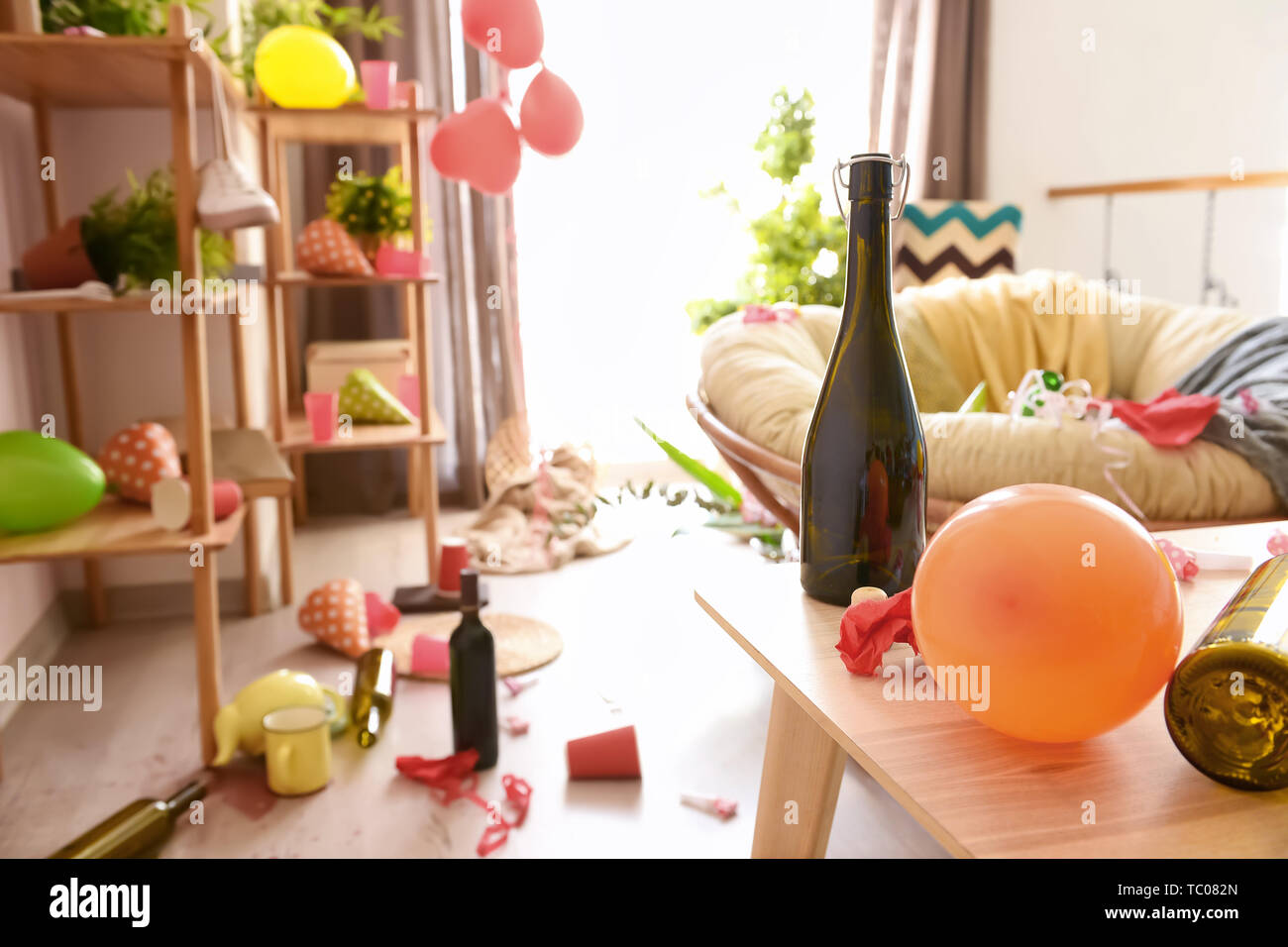 Room in terrible mess after party Stock Photo - Alamy
