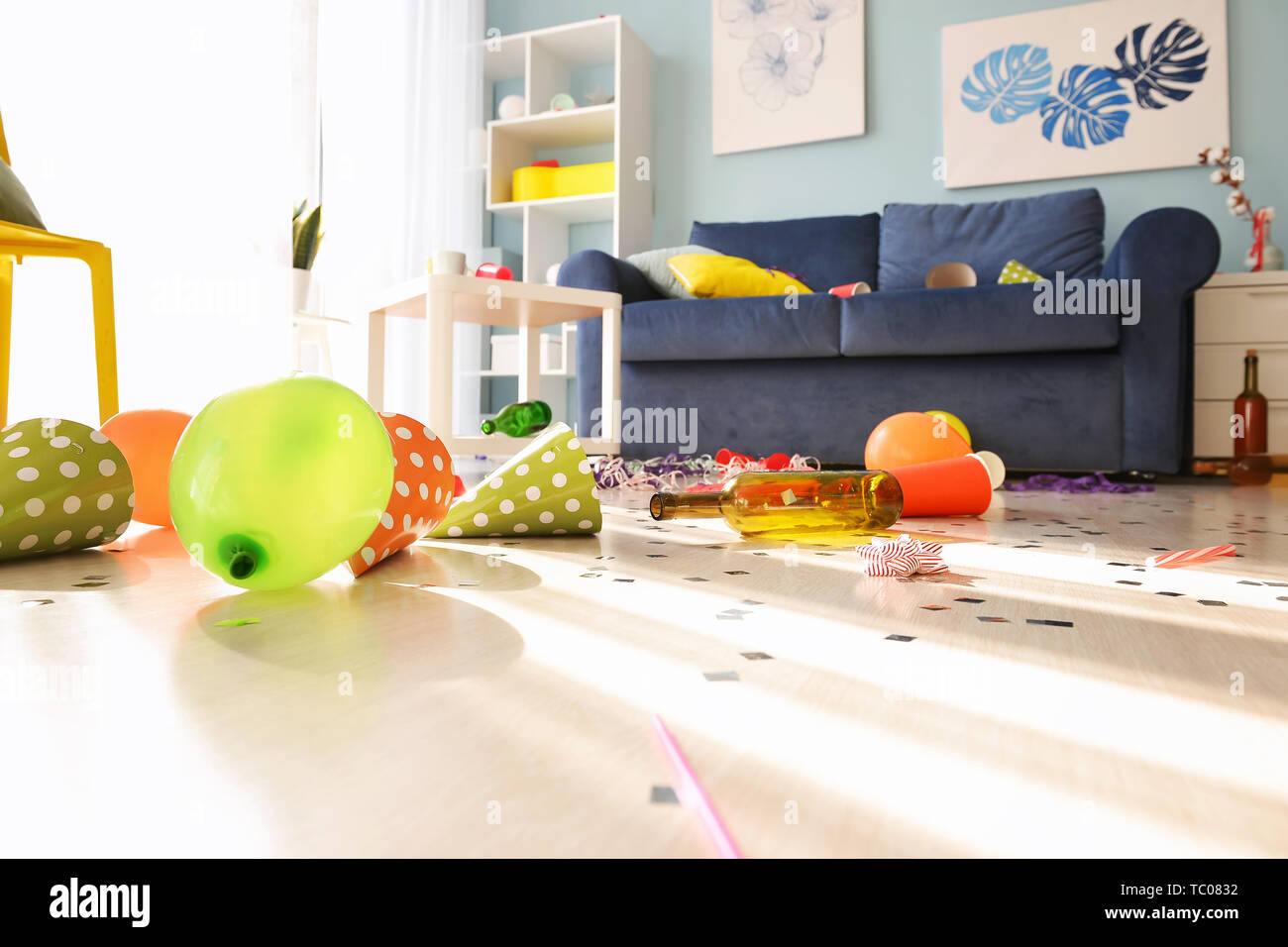 Room in terrible mess after party Stock Photo - Alamy