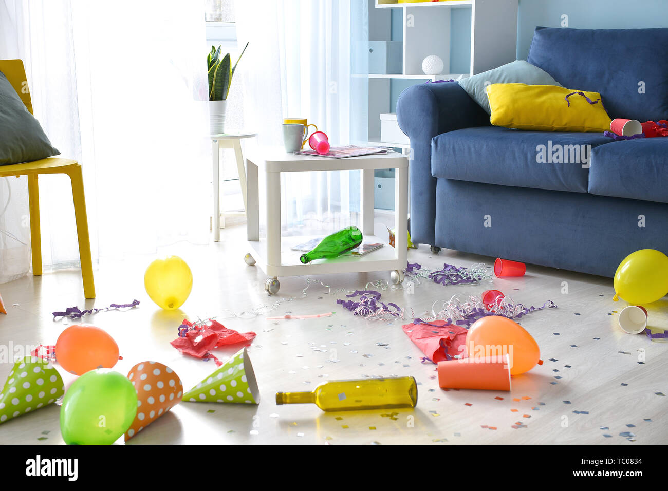 Room in terrible mess after party Stock Photo - Alamy