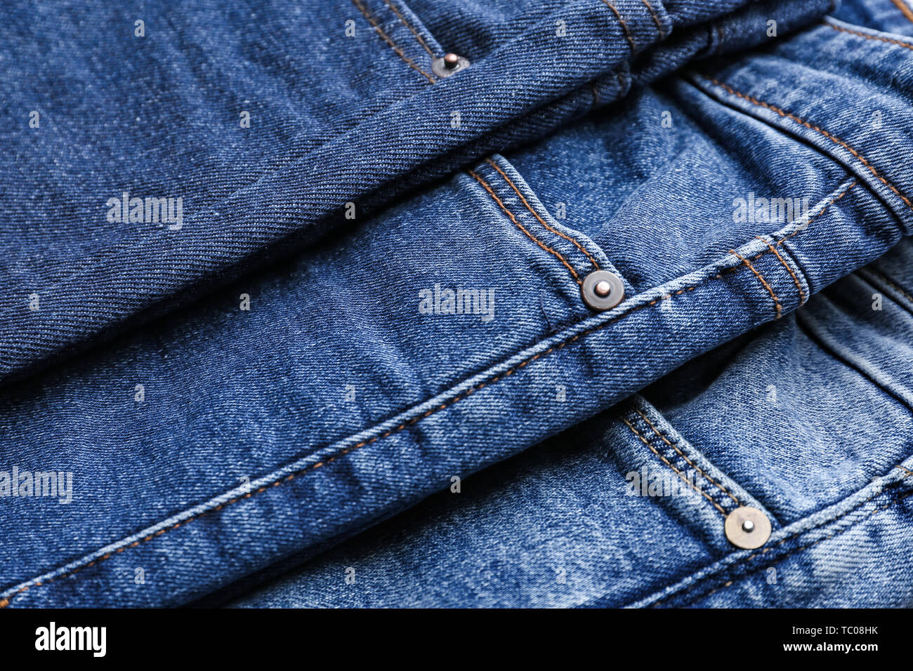 Different stylish jeans, closeup view Stock Photo - Alamy