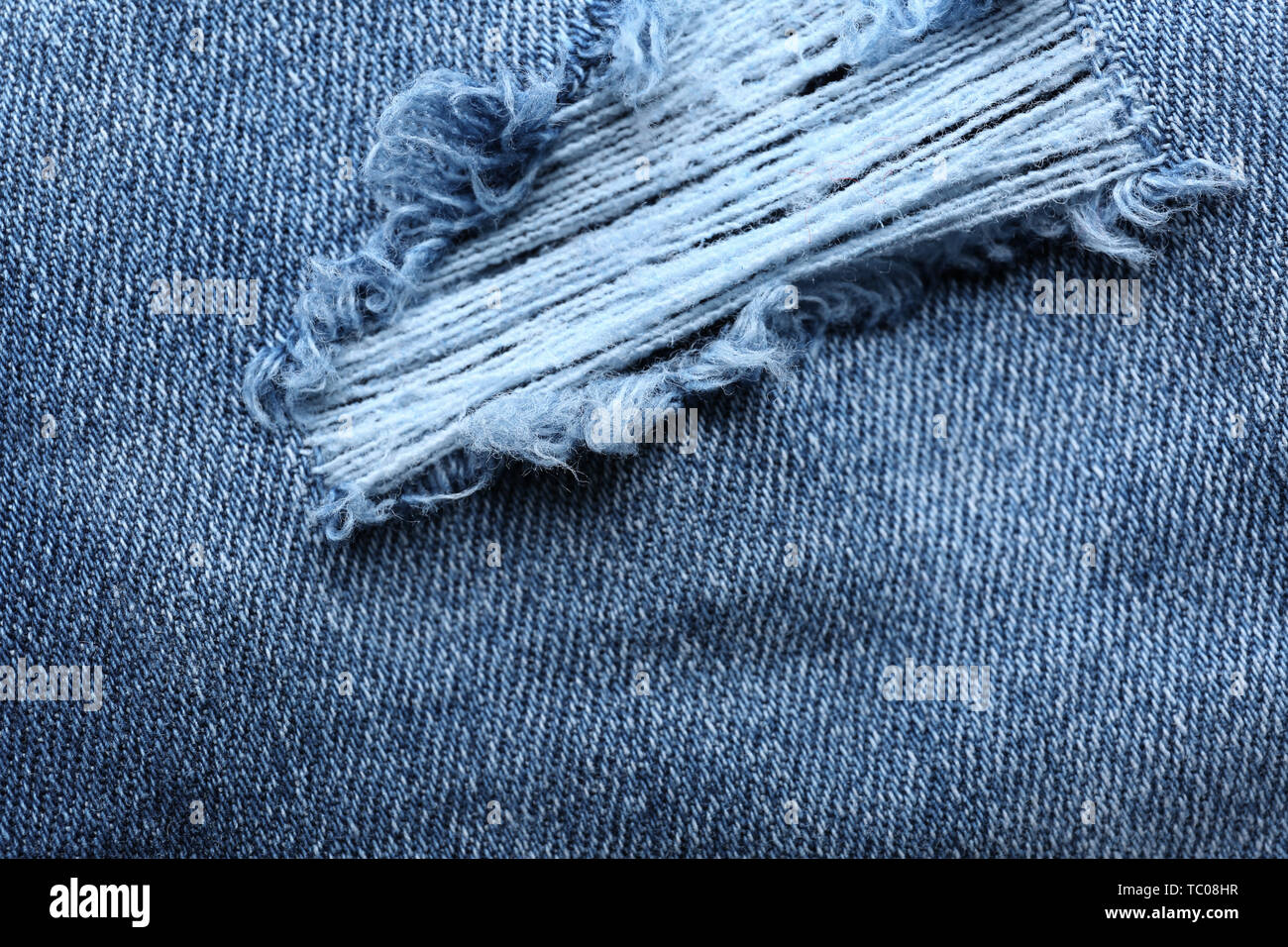 Ripped distressed jeans hi-res stock photography and images - Alamy