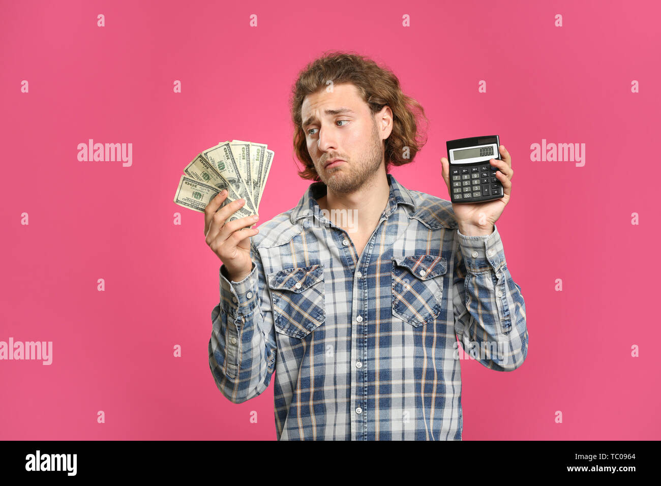Confused by calculator hi-res stock photography and images - Alamy