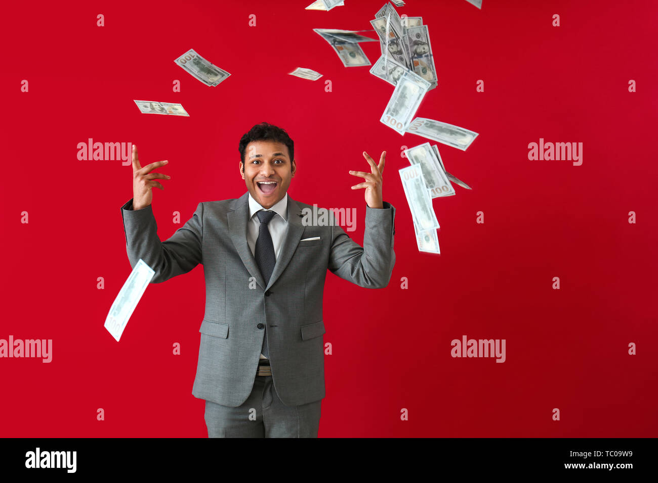 Indian business man falling money hi-res stock photography and images ...