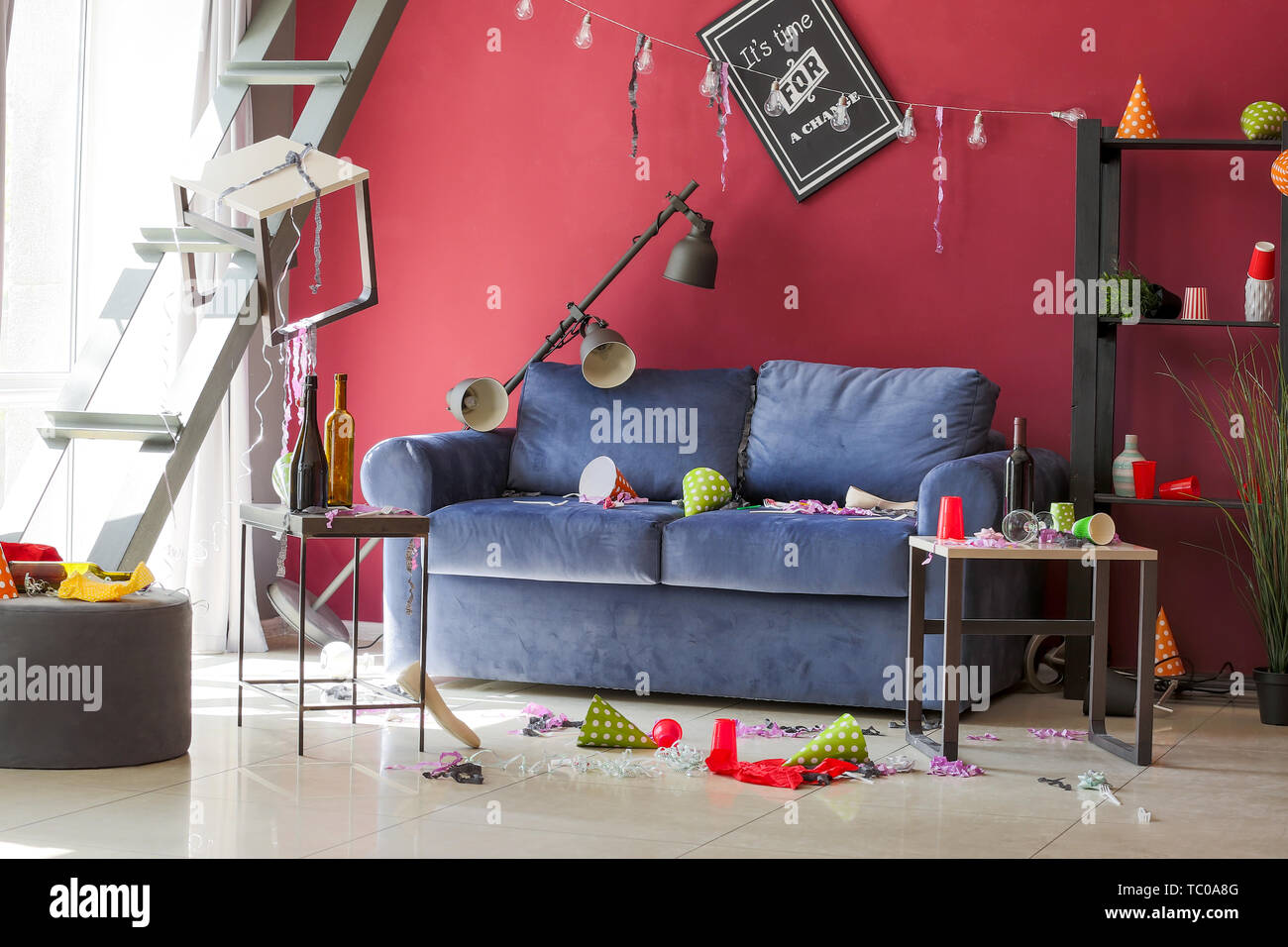 Room in terrible mess after party Stock Photo - Alamy