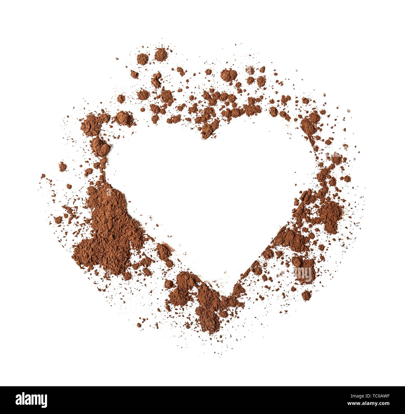 Heart made of cocoa powder on white background Stock Photo - Alamy