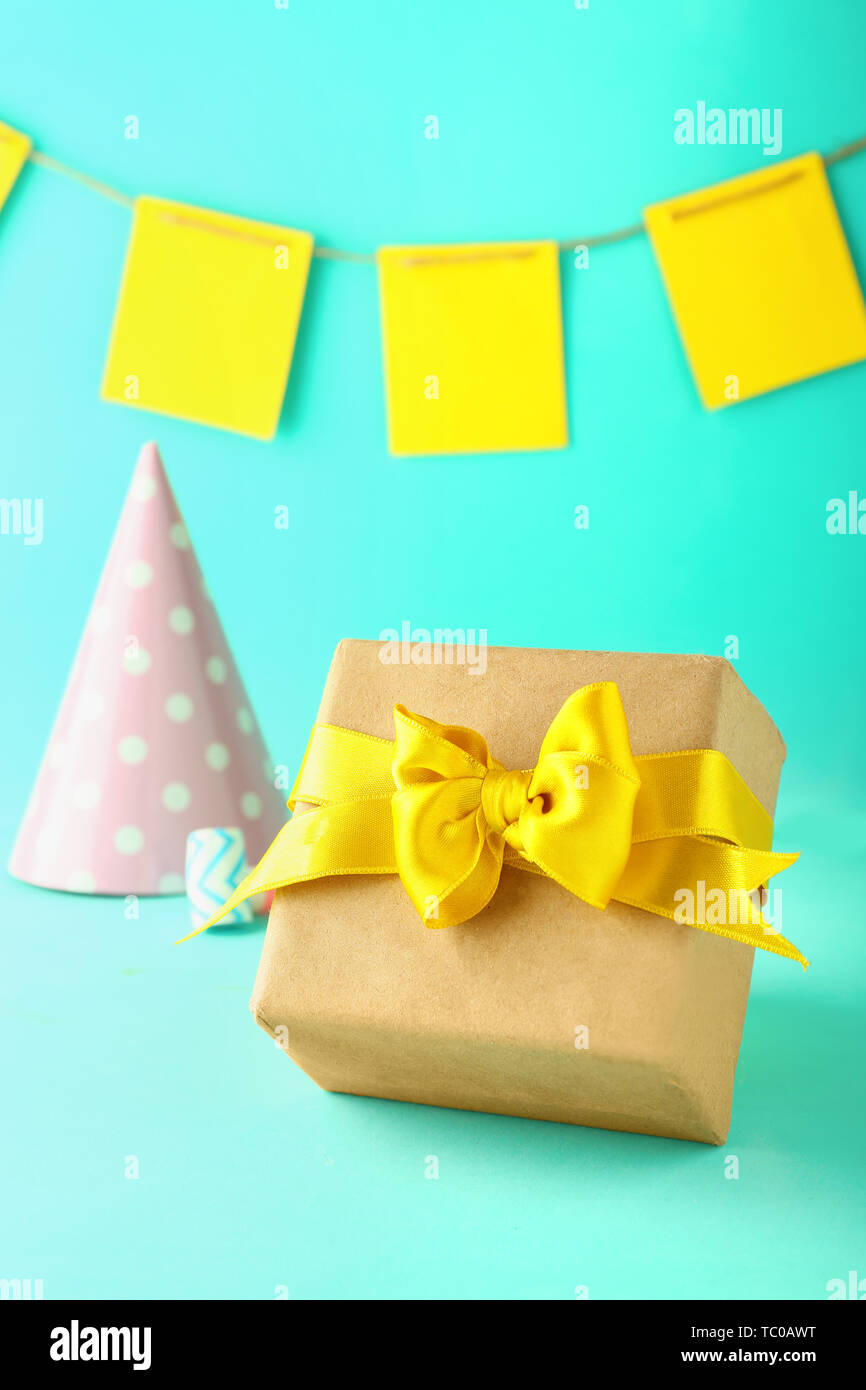 Beautiful Birthday gift box and decor on color background Stock Photo ...