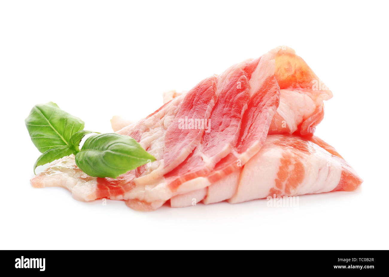 Raw bacon strips on white background Stock Photo - Alamy