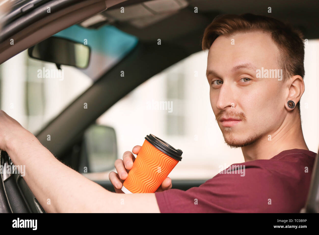 Man drinking coffee in car hi-res stock photography and images - Alamy