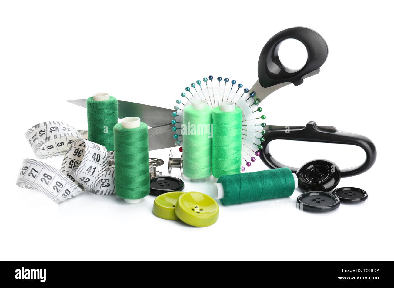 Set of sewing accessories on white background Stock Photo - Alamy