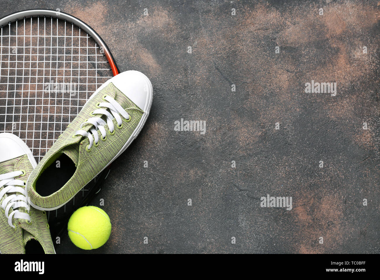 Tennis racket, shoes and ball on grunge background Stock Photo - Alamy