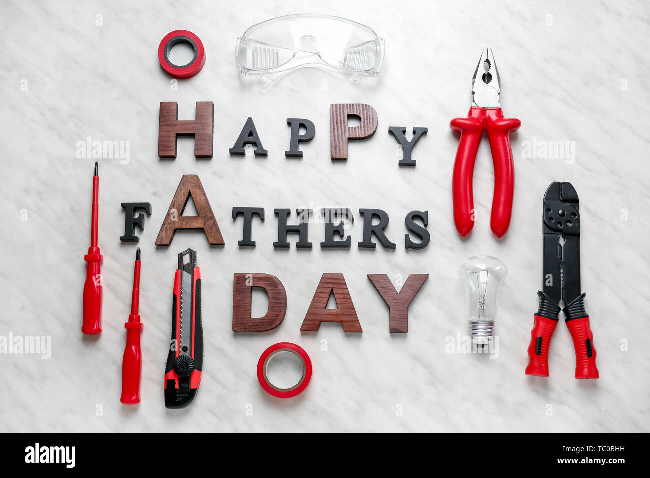 Different tools and text "Happy Father's Day" on light background Stock ...