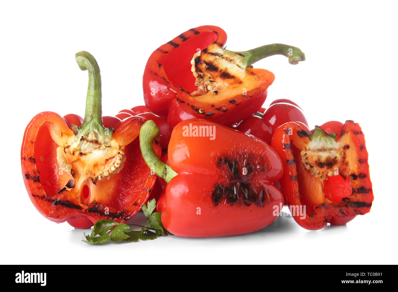 Grilled red peppers on white background Stock Photo - Alamy