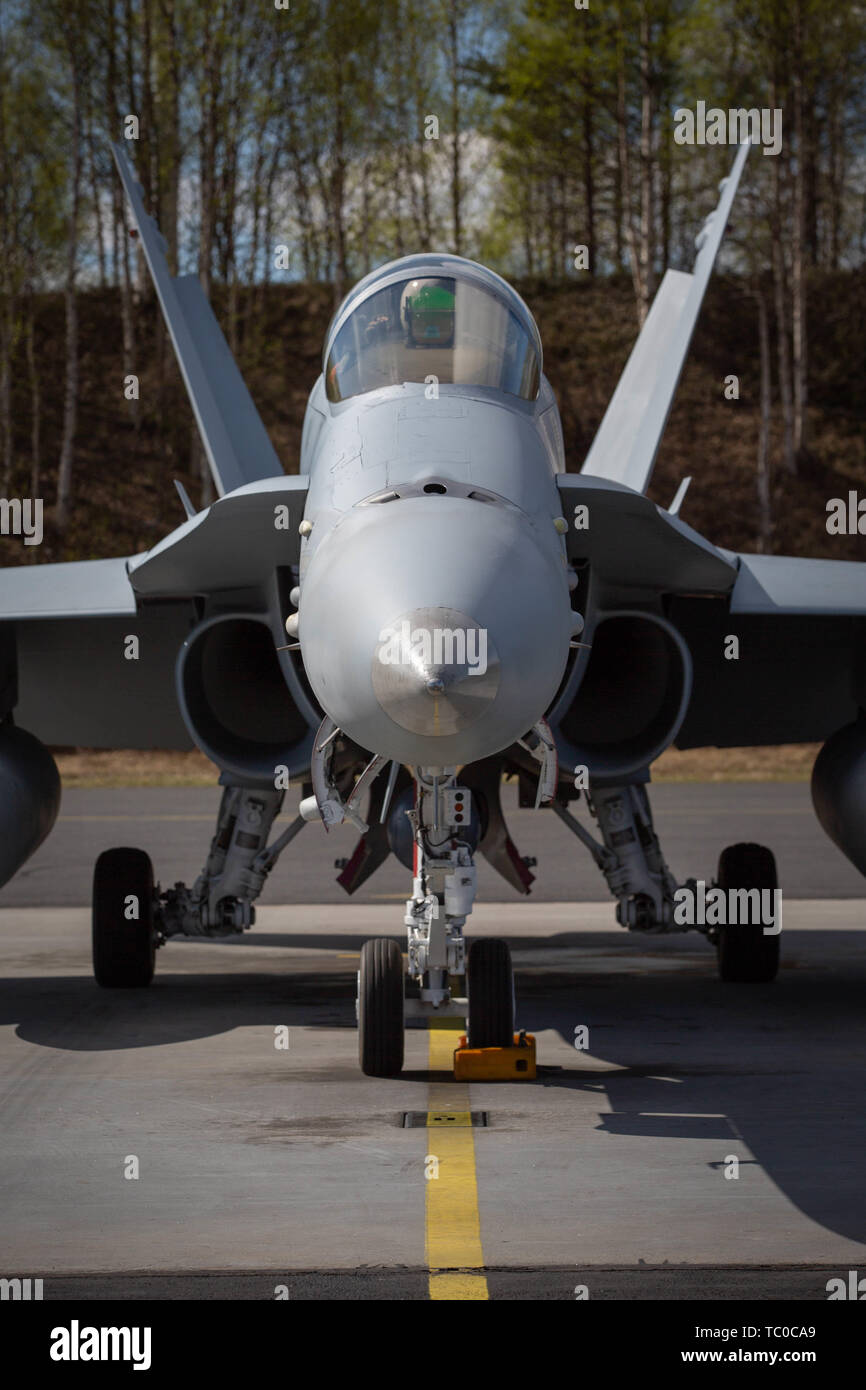 A U.S. Marine Corps F/A-18 Hornet prepares for takeoff during the ...