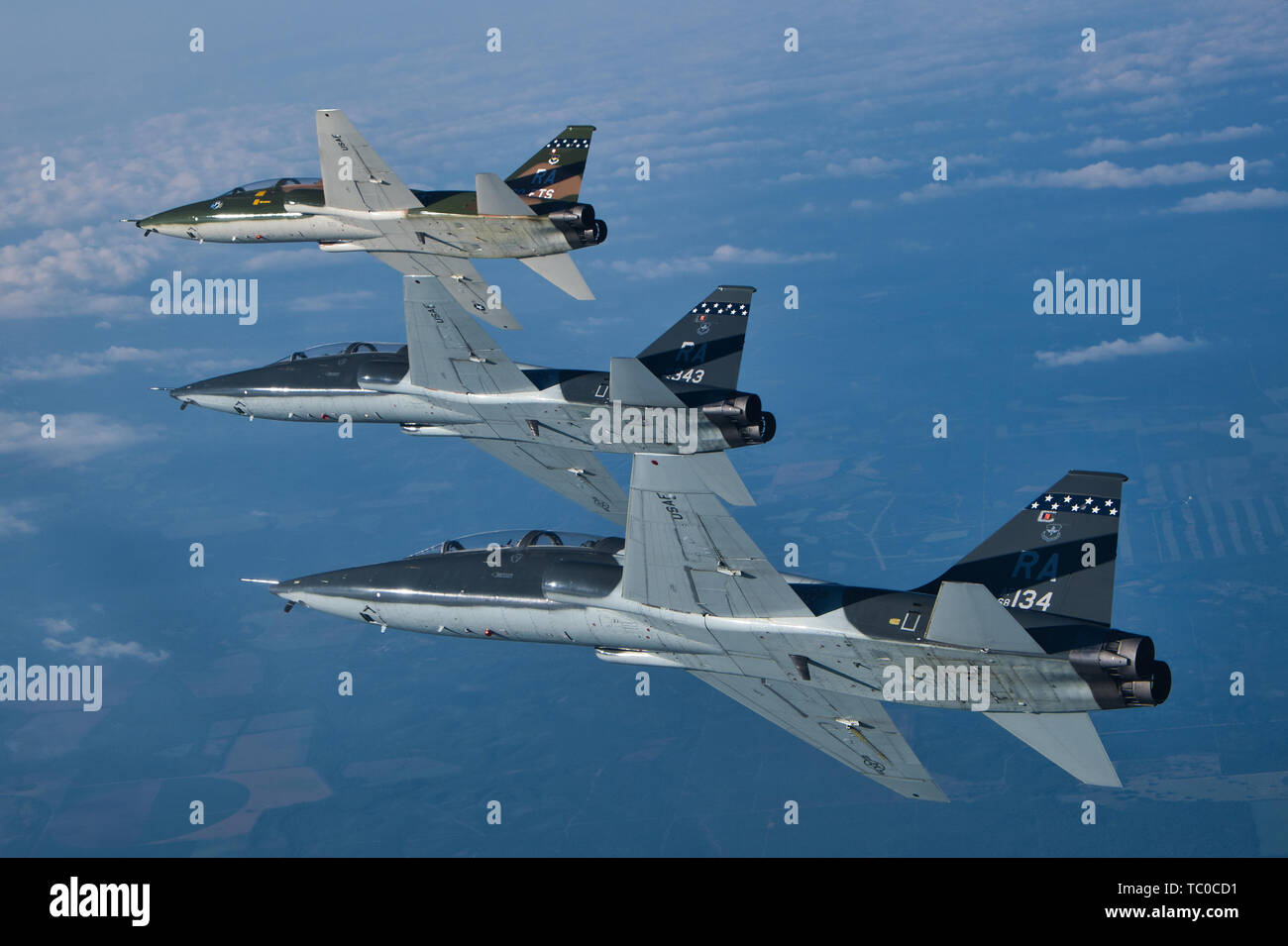 Pilots assigned to the 560th Flying Training Squadron fly in an echelon ...