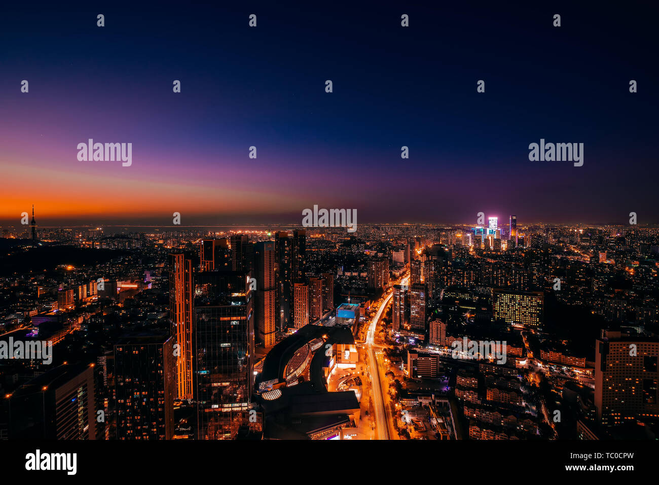 Night view of climbing buildings in Qingdao Stock Photo - Alamy